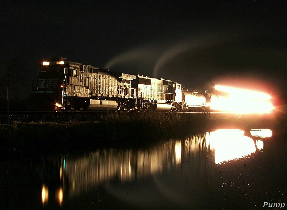 Northbound UP Auto Train Passing a Tied Down UP Northbound Manifest